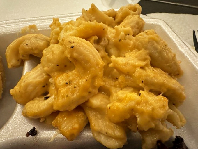 Mac and cheese that doesn't just comfort, it embraces. This isn't your childhood version; it's what your childhood version dreamed of becoming.