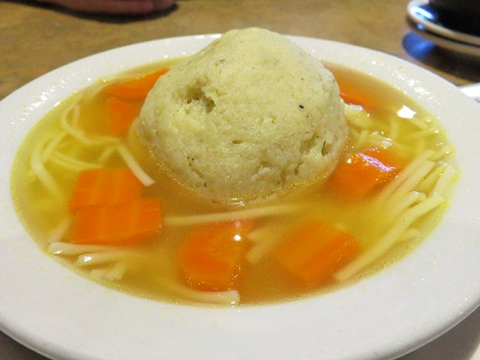 The matzo ball soup at Ben & Irv's &ndash; where the dumplings float like celestial bodies in a universe of golden chicken broth. Jewish penicillin at its finest.