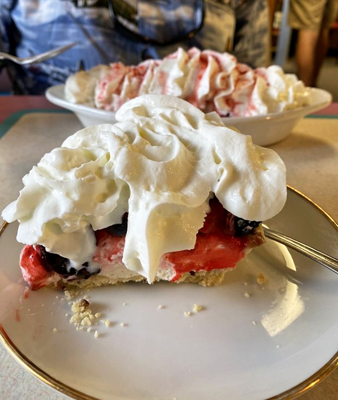 Berry shortcake that would make Grandma jealous – clouds of whipped cream nestled with fresh berries atop a buttery foundation.