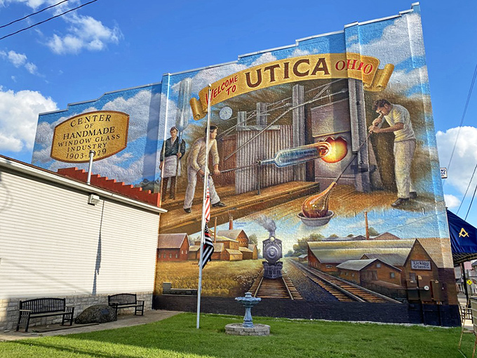 Art tells the story where words fall short. This magnificent mural captures Utica's glassmaking heritage, transforming a simple wall into a vibrant historical document.