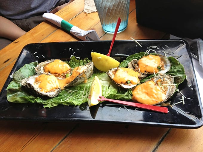 Oysters Rockefeller's fancy cousin has arrived at the party, bringing cheese, seasoning, and a touch of coastal decadence to your table.