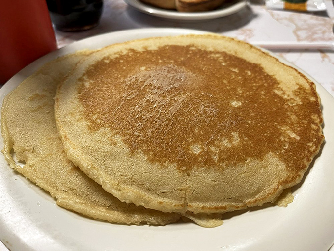 Pancake perfection doesn't need to be complicated. Golden-brown, plate-sized, and ready for a maple syrup waterfall—breakfast doesn't get more honest than this.