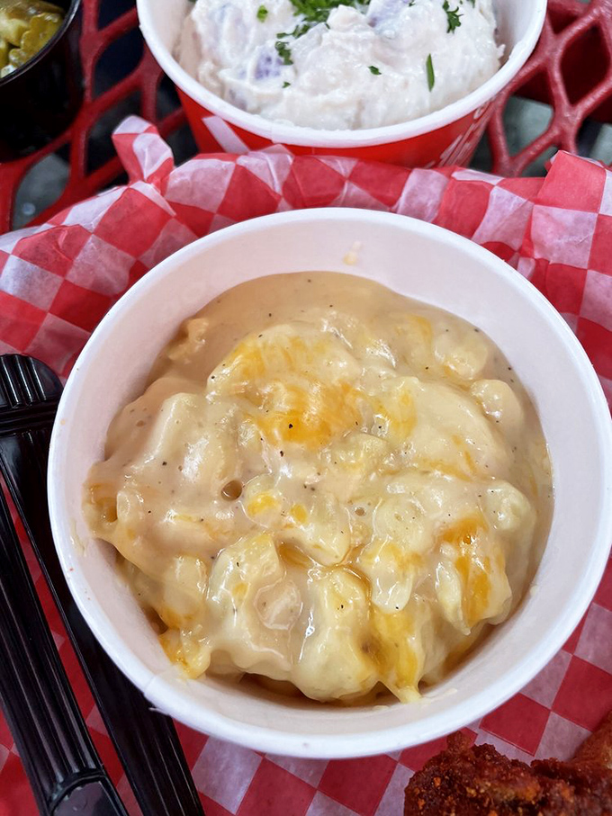 The pimento mac and cheese arrives like a velvet painting&mdash;smooth, rich, and completely unapologetic about its indulgent Southern charm. 