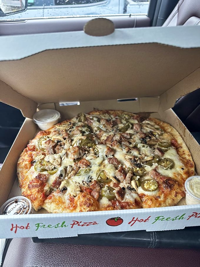 The $9 pizza that launched a thousand road trips - jalape&ntilde;os and melty cheese making car interiors smell like heaven.