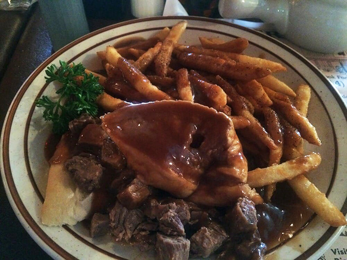 The legendary Roast Beef Canoe in all its gravy-soaked glory. This isn't a meal&mdash;it's what homesickness tastes like when you've been away too long.