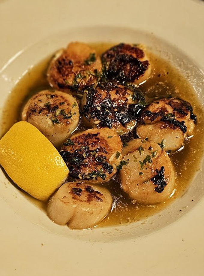 These seared scallops aren't just cooked&mdash;they're transformed into buttery ocean jewels swimming in a garlicky broth that begs to be sopped up.