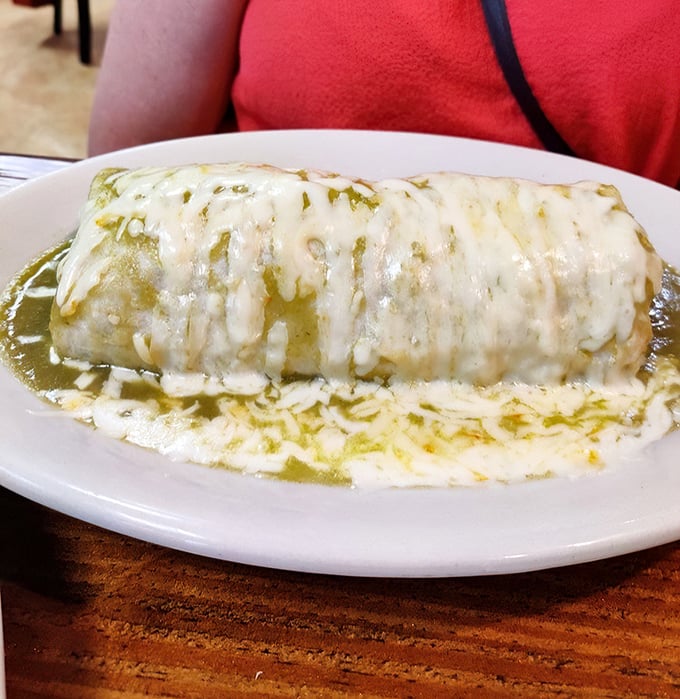 Not all heroes wear capes&mdash;some wear melted cheese and green salsa. This burrito has saved countless Floridians from boring lunches.