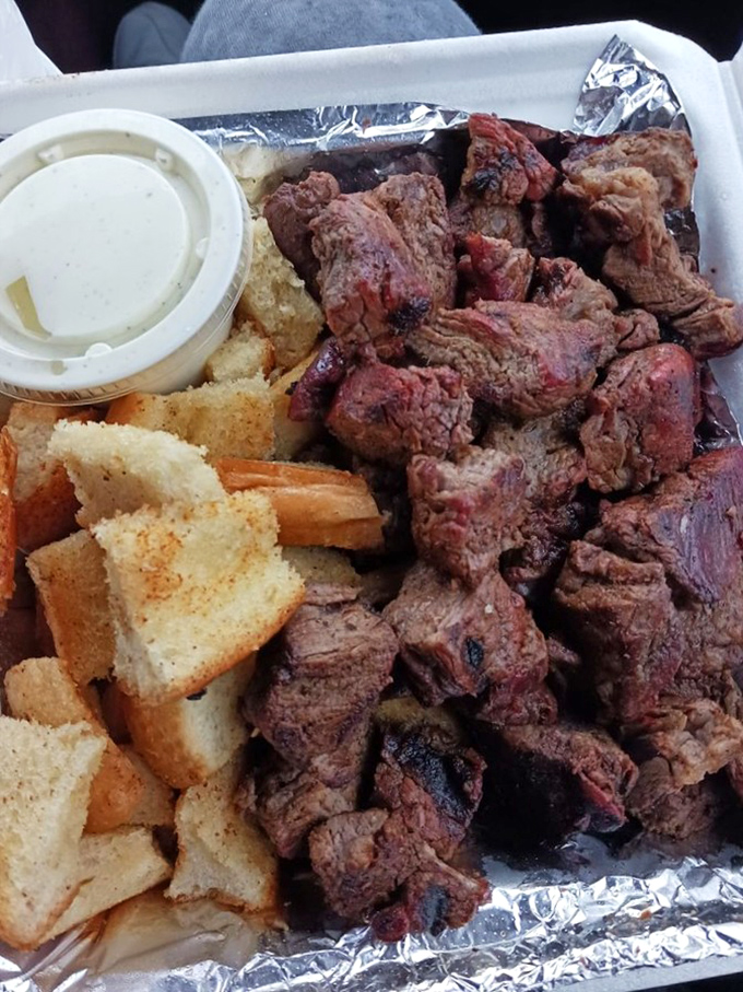 Steak bites that prove good things come in perfectly seasoned, oak-smoked packages with garlic bread backup.