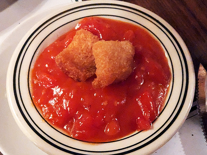 The stewed tomatoes at Pine Club aren't just a side dish&mdash;they're practically their own food group in Dayton, with those golden croutons floating like treasure.