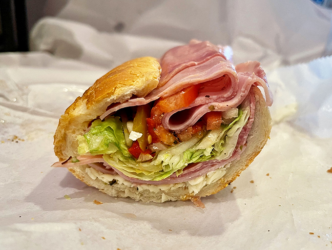 This Italian sub isn't just stacked &ndash; it's a geological marvel with distinct layers of deliciousness requiring both hands and possibly a spotter.