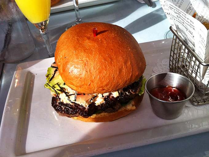 This isn't just a burger&mdash;it's architecture. A perfectly stacked masterpiece that makes you wonder if it's too beautiful to eat. (It's not.)