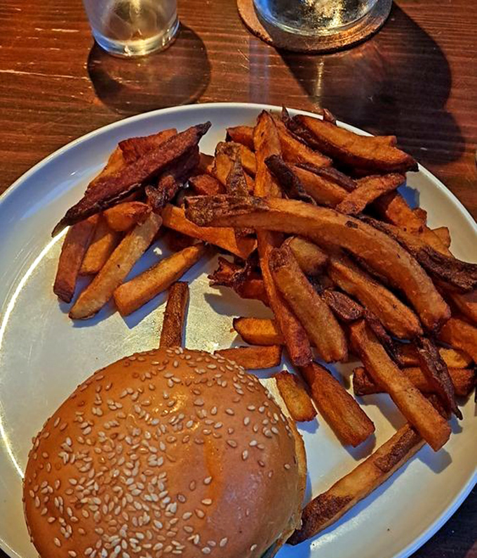Sweet potato fries so golden they practically glow with their own inner happiness.