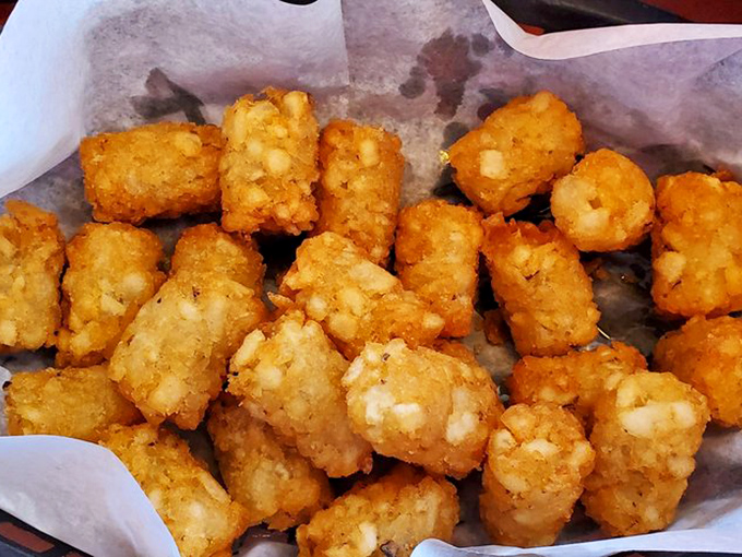 Tater tots aren't just for school cafeterias anymore. These crispy potato nuggets will transport you back to childhood while satisfying very adult cravings.