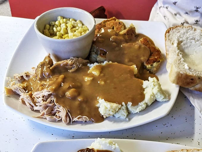 When gravy cascades over mashed potatoes like Niagara Falls, you know you're in for comfort food that hugs your soul.