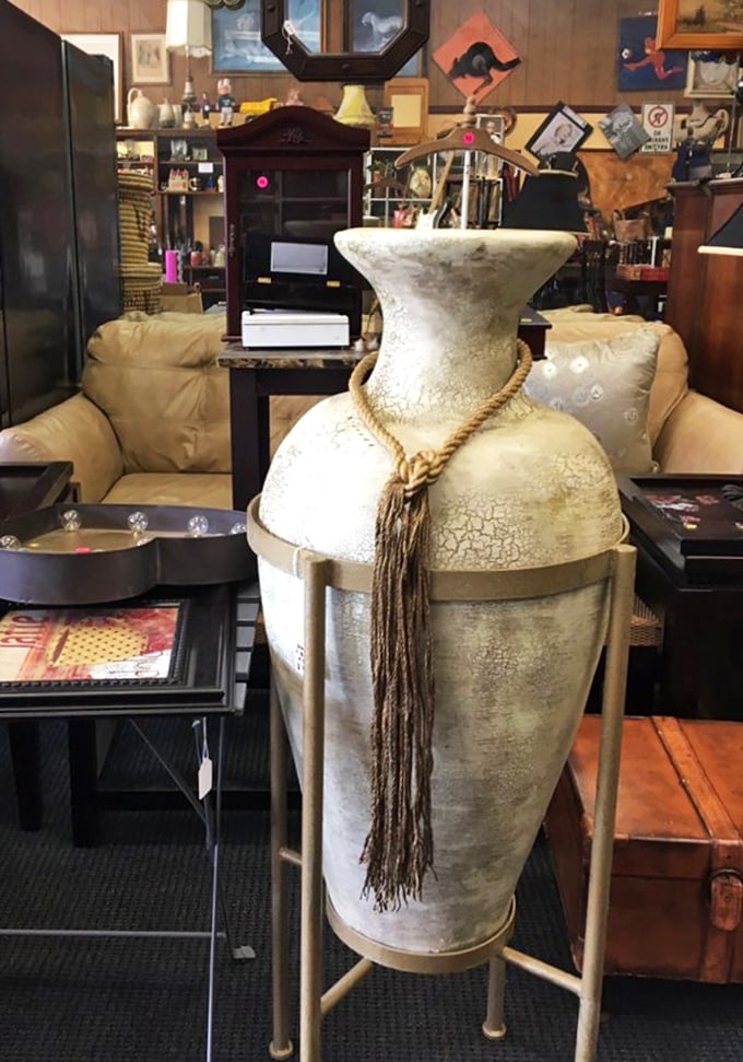 This stunning decorative vase proves that one person's storage solution can become another's perfect centerpiece for their dining room.