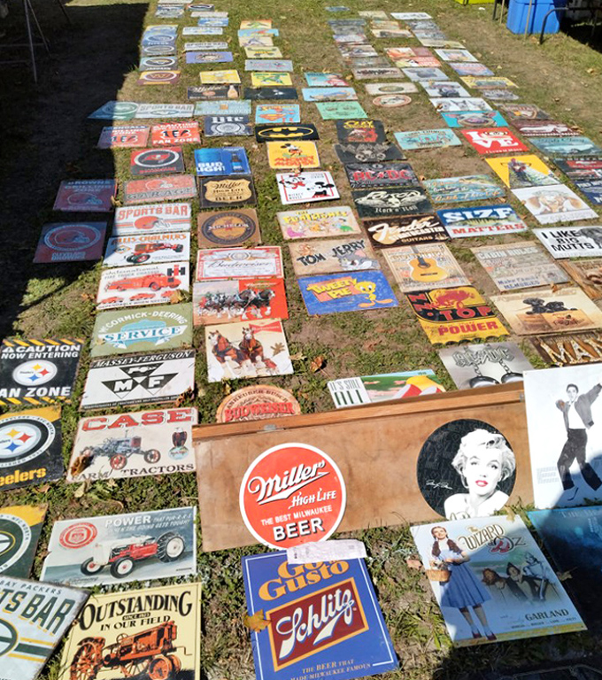 A field of nostalgia laid out on grass. These vintage-style metal signs would transform any man cave from basic to museum-worthy.