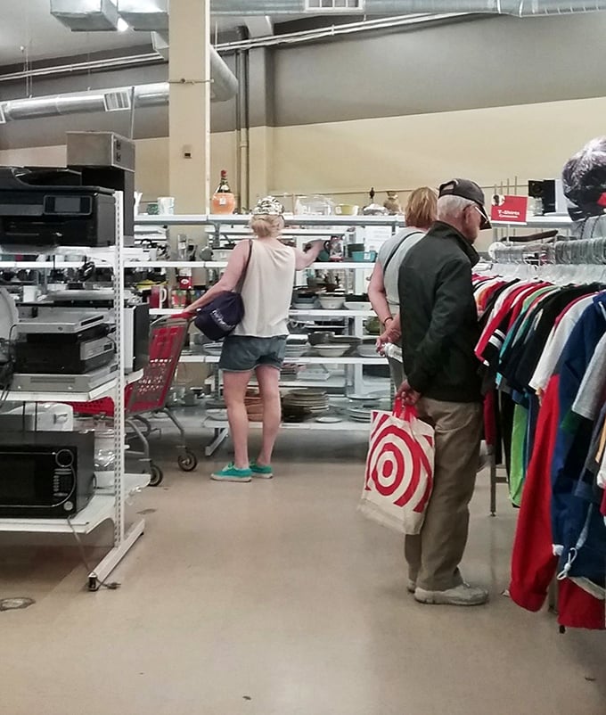 Serious treasure hunters in their natural habitat. That Target bag will soon be filled with finds that friends won't believe "used to belong to someone else."