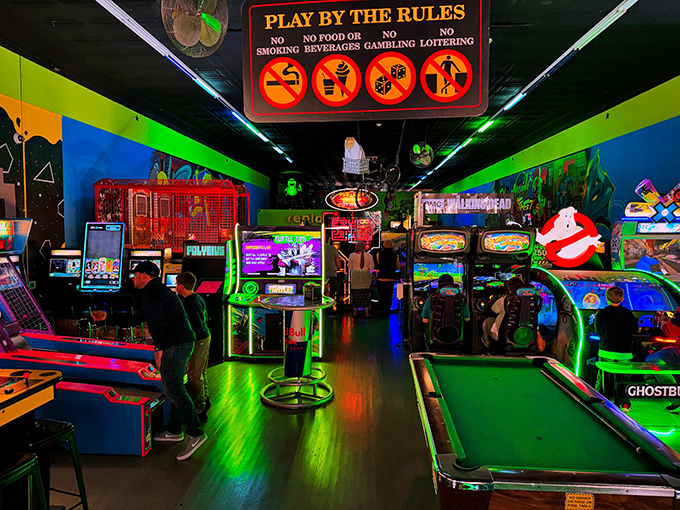 Where modern meets retro under the glow of arcade lights. The rules are simple: no food, no smoking, just pure unadulterated gaming joy.