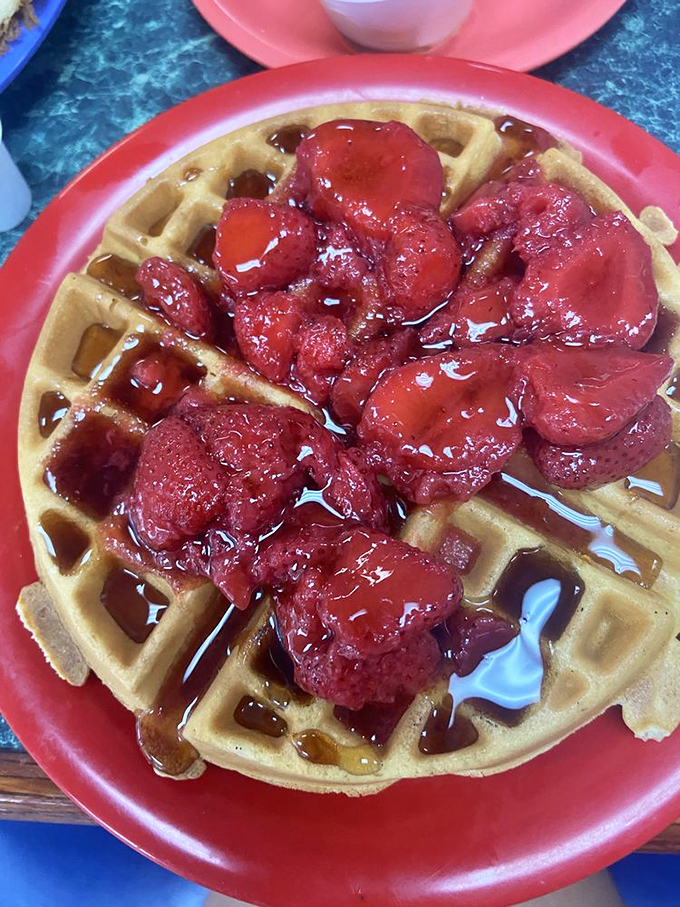 This Belgian waffle topped with strawberries isn't just breakfast&mdash;it's edible artwork that somehow tastes even better than it looks.