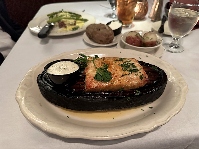 Sizzling whitefish on a hot plate&mdash;the kind of simple, perfect preparation that makes you wonder why anyone bothers with culinary fads.