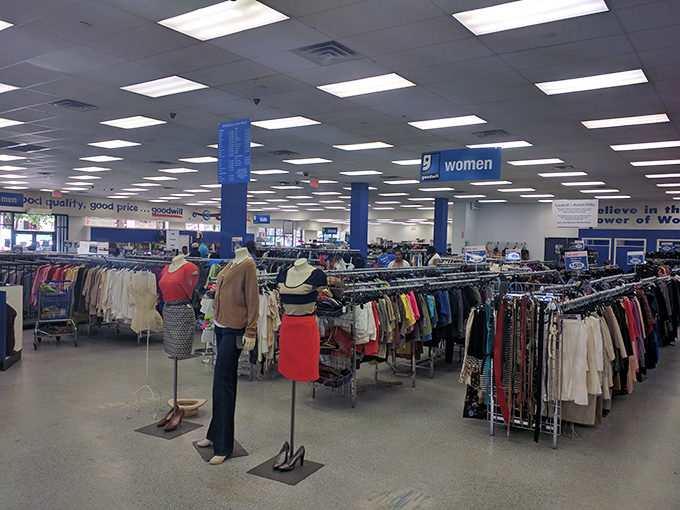 The women's section stands organized with military precision, color-coded racks creating a rainbow road to affordable style.