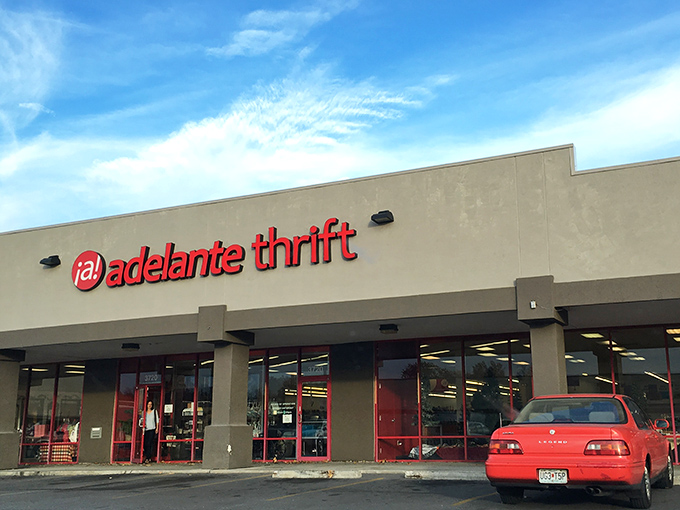 Adelante Thrift's bold red signage pops against the neutral building. A splash of color that hints at the vibrant treasures within.