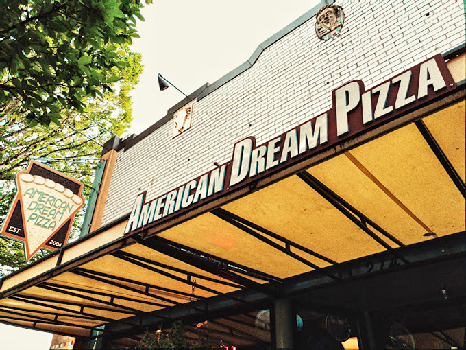 American Dream's triangular slice logo is the North Star for hungry Corvallis pizza pilgrims.