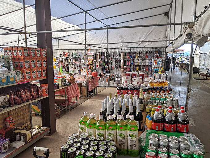 This Yuma market stall showcases Arizona pride alongside everyday essentials. The desert version of "if we don't have it, you don't need it!"
