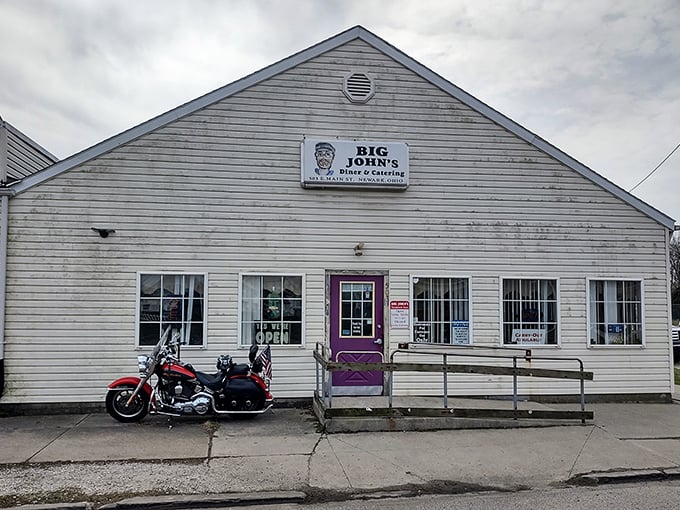 Big John's unassuming exterior hides culinary greatness. That purple door? It's the entrance to pancake paradise.