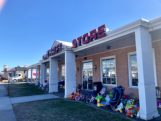 CHKD Thrift's welcoming facade hints at the wonderland of pre-loved treasures inside, with children's toys standing sentinel outside.