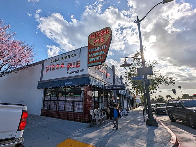 That vintage neon sign has been guiding hungry Angelenos to pizza paradise since Elvis was topping the charts.