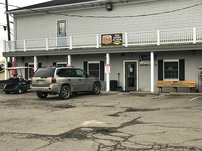 A humble building serves as a local gathering spot in Charm. Simple exteriors often hide the richest experiences.