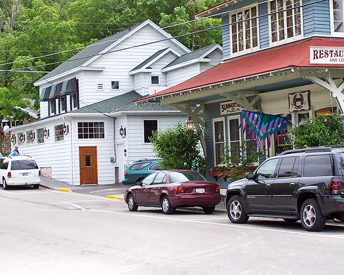 Fish Creek's charming storefronts welcome visitors with colorful awnings and inviting doorways. Shopping paradise without the crowds!