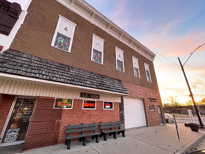 Guy & Mae's evening glow creates a beacon of barbecue hope. That star isn't just decoration—it's a rating system!