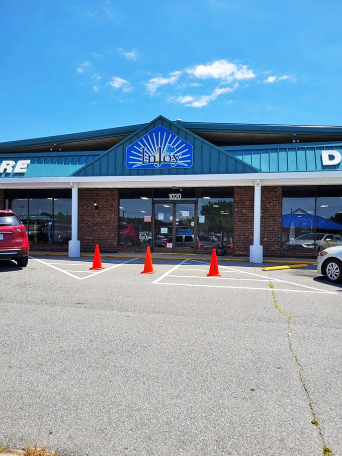 InJoy's blue sunburst logo promises exactly what you'll find inside&mdash;pure shopping joy and unexpected treasures.