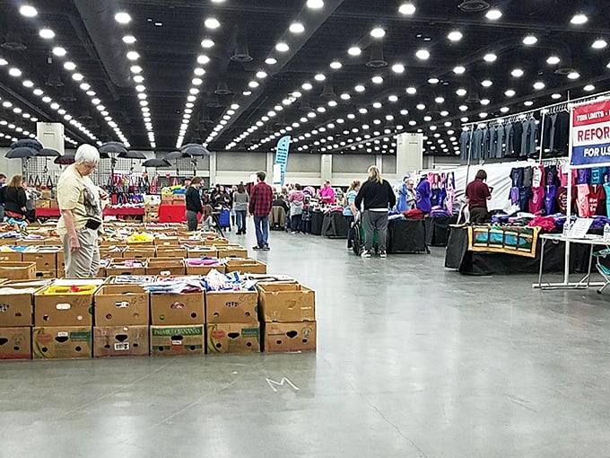 Where bargain hunters gather under bright lights. The Kentucky Flea Market's vast space transforms shopping into a social event.