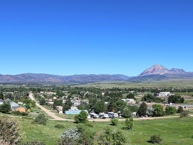 La Veta sits like a painting beneath Spanish Peaks, where mountain majesty doesn't demand a mountain-sized mortgage.
