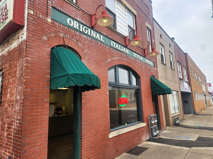 Police Station Pizza: This historic building once housed law enforcement, now it enforces delicious pizza laws. Talk about a career change!