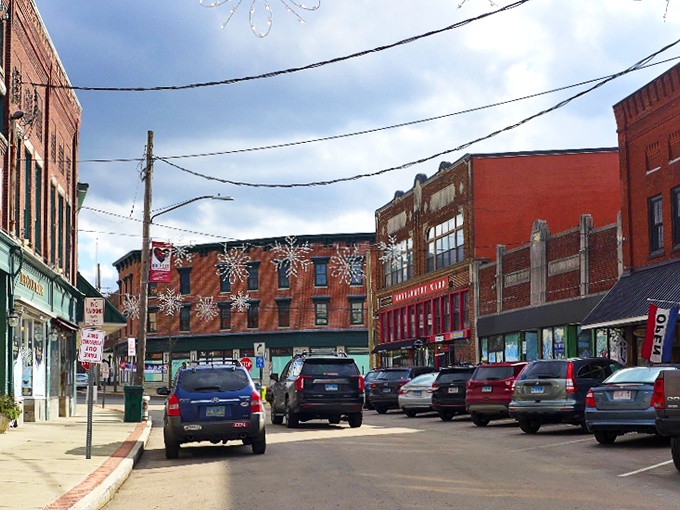 Putnam's historic red buildings stand as colorful reminders of New England's past, preserved for budget-conscious admirers.