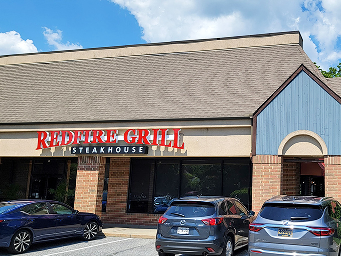 Redfire's bold red sign makes a promise it definitely keeps. No subtlety here – just straightforward steak satisfaction!