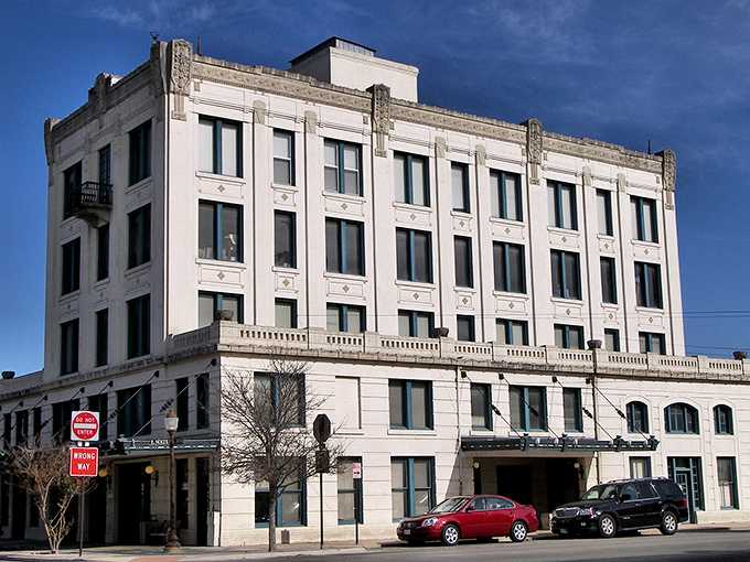Seguin's courthouse commands attention like a monarch overseeing a kingdom where affordability reigns and healthcare access is the royal decree.