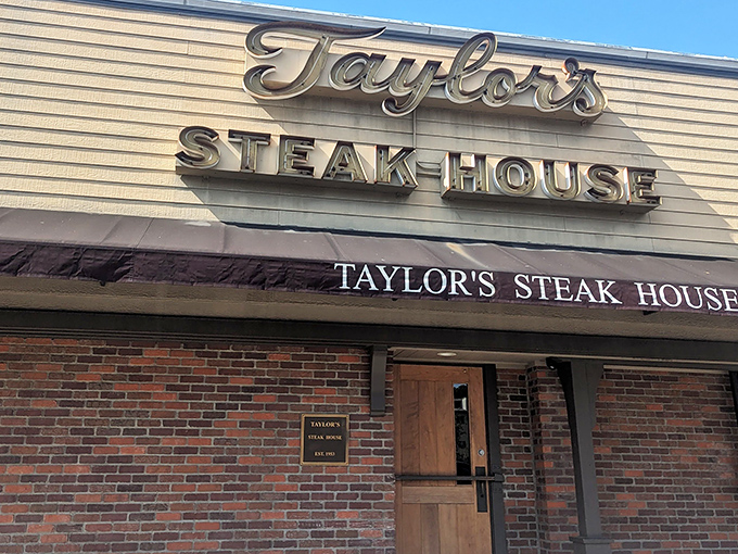Taylor's Steakhouse sign promises old-school excellence with no flash, no gimmicks - just decades of steak-making wisdom behind those doors.
