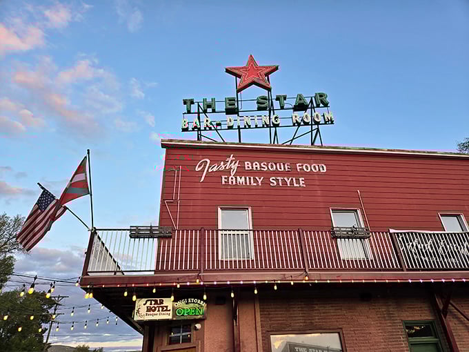 The Star Hotel's iconic red exterior and vintage sign have been calling hungry travelers to experience Basque-style feasts for generations.