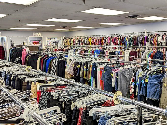 Densely packed racks of carefully curated clothing await. It's like a treasure hunt sponsored by your local schools!