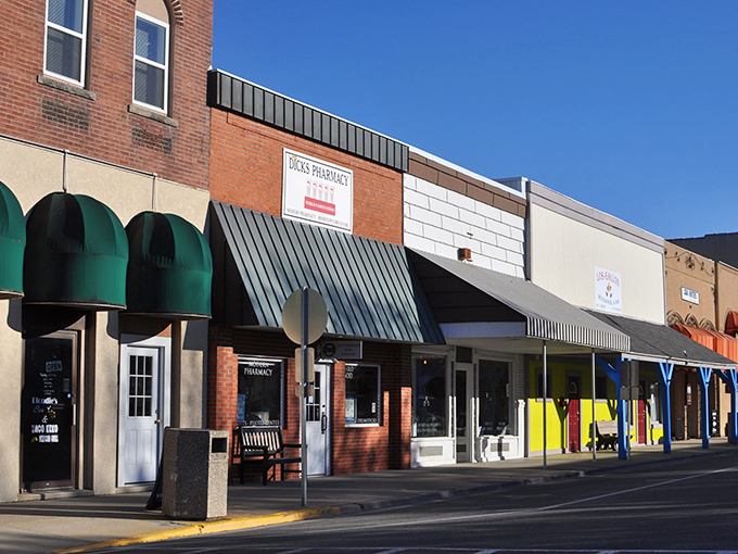 Main Street in Arthur offers a glimpse into simpler times, though you might find yourself complex feelings of envy for this peaceful pace of life.
