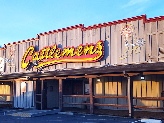 Those wooden cowboy sentries guard the entrance to beef paradise. They've seen thousands of happy, full customers leave.