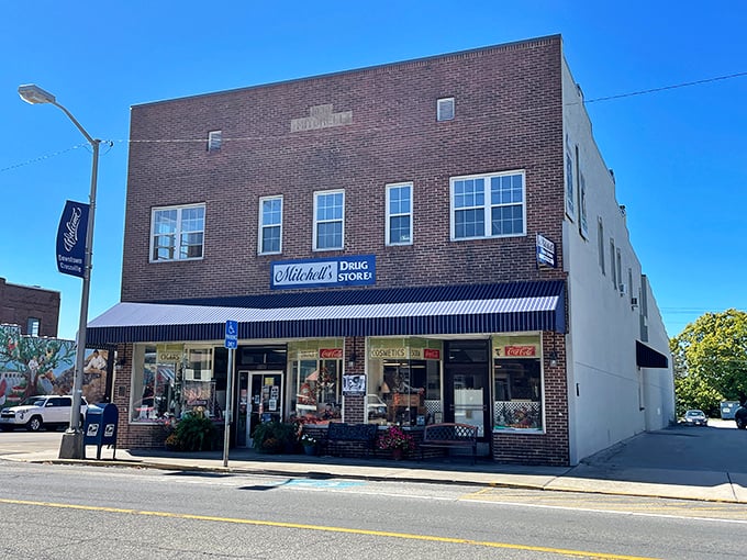 Sunlight bathes Crossville's brick buildings in golden warmth, creating the kind of downtown view that makes you want to park and wander.