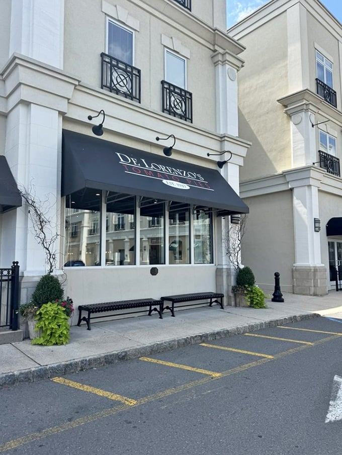 Those black benches outside De Lorenzo's aren't just for sitting &ndash; they're for recovering after a religious tomato pie experience.