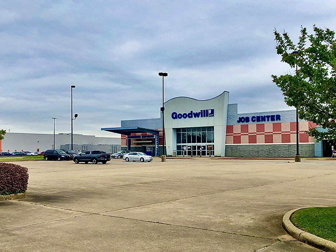 The curved entrance beckons bargain hunters inside like a gentle wave, promising treasures at tsunami-sized discounts.