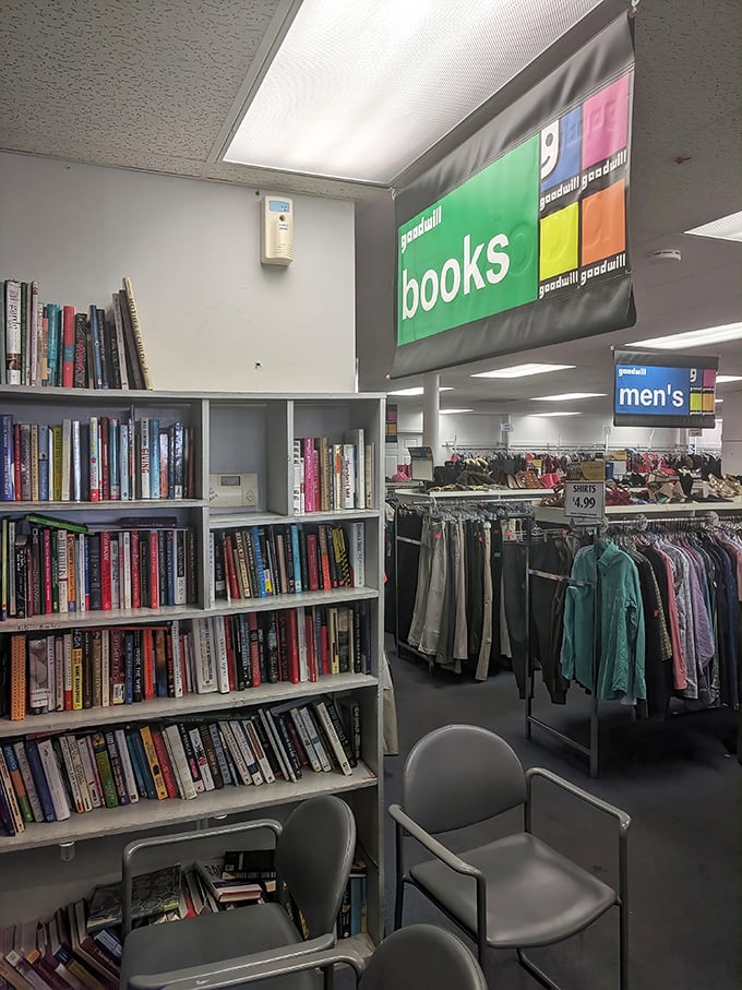 Goodwill's well-organized book corner invites literary treasure hunters. Where paperback adventures cost less than a cup of coffee!